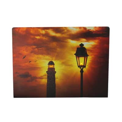 LED Lighthouse & Lamp Post with Amber Sky Canvas Wall Art | Michaels