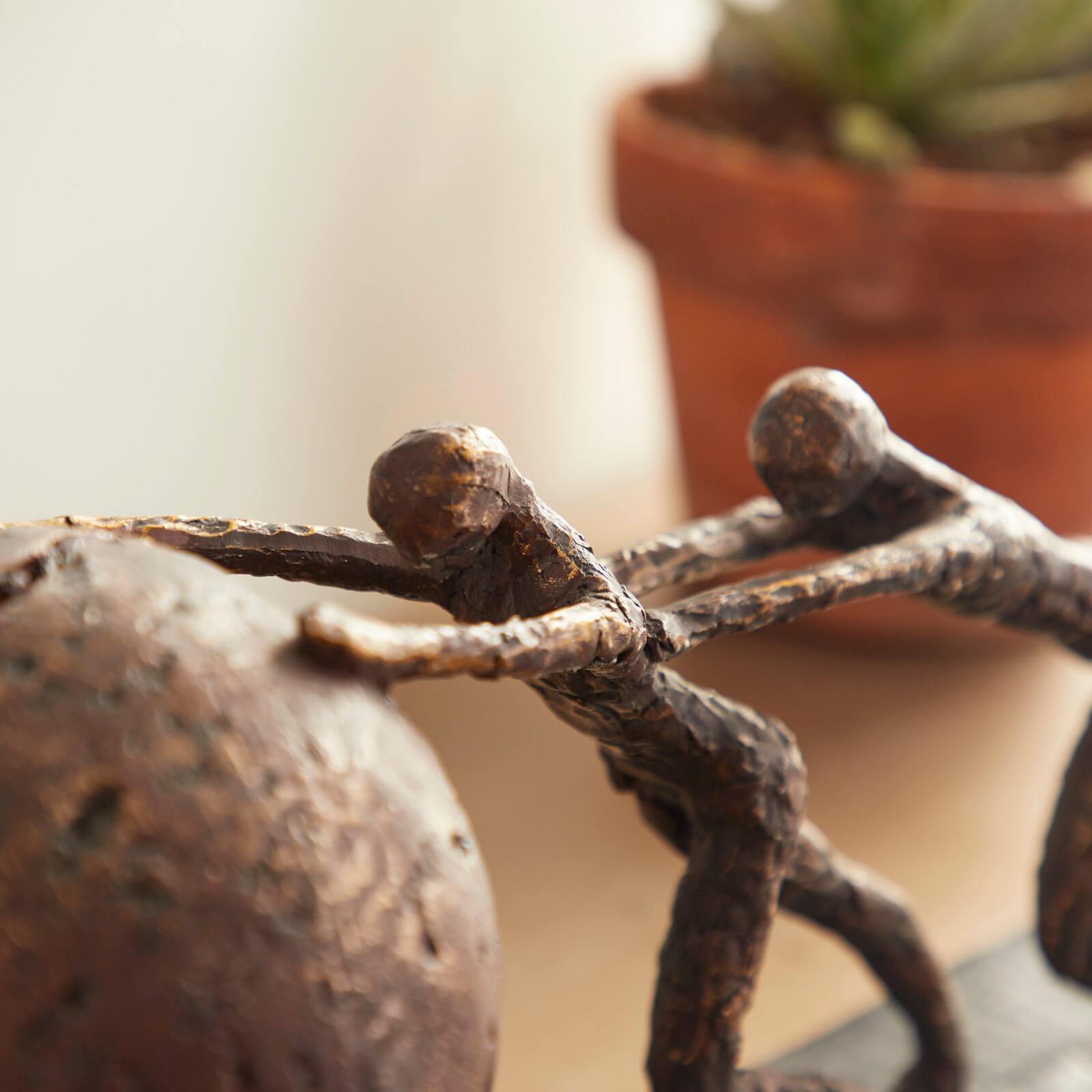 23" Brown Polystone Industrial Sportsman Sculpture | Michaels