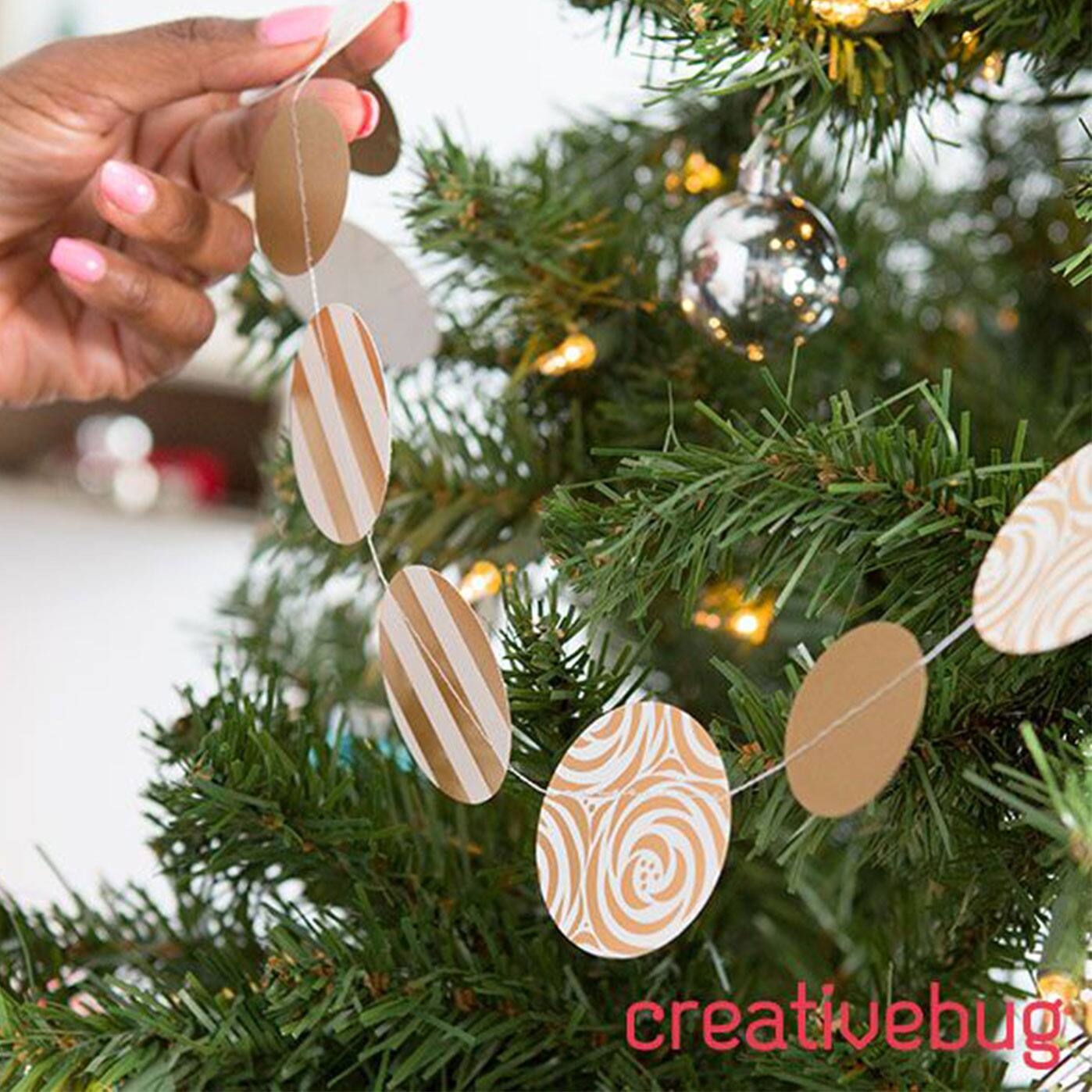 Gold and White Paper Punched Tree Garland | Projects | Michaels
