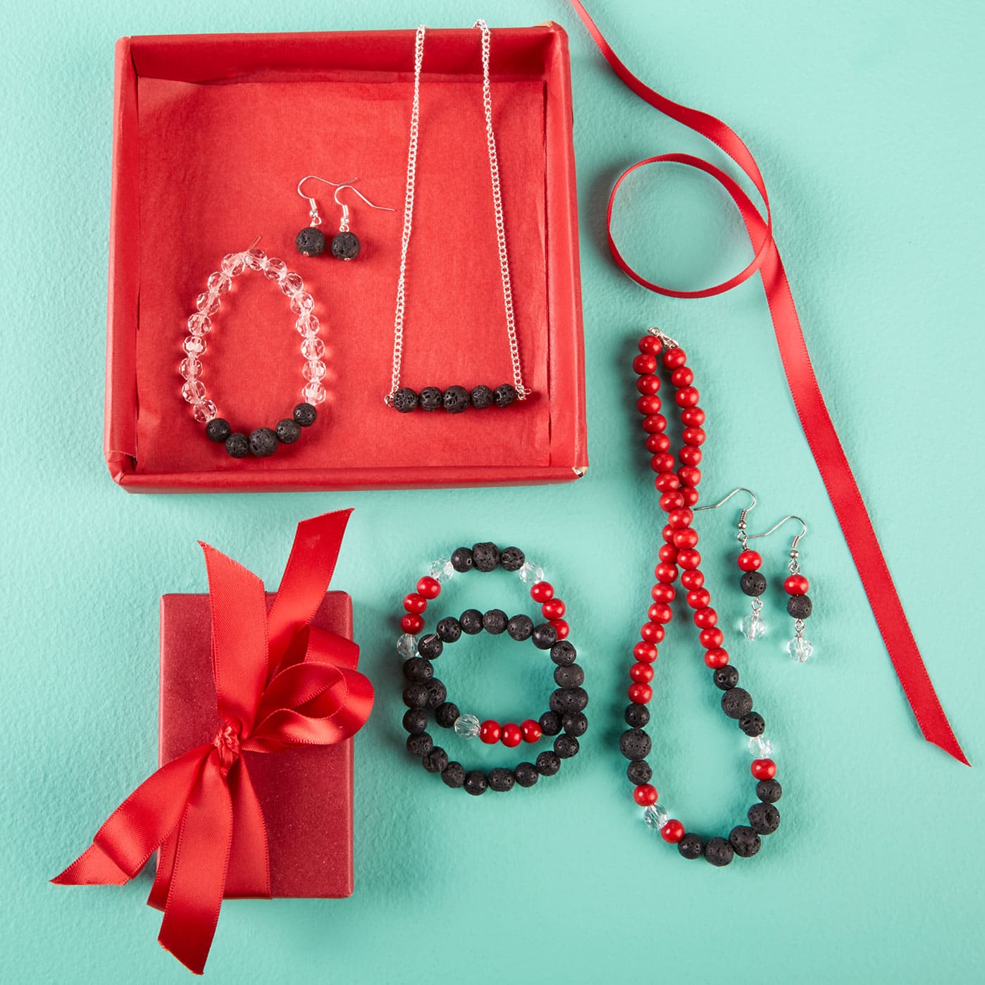 Red and Black Lava Bead Stacking Bracelets | Michaels